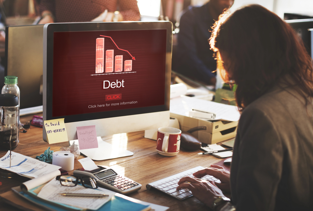 woman-working-on-debt.jpg